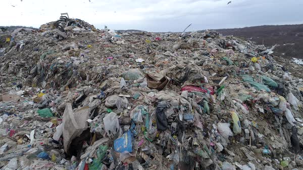 Aerial drone view of large garbage landfill, trash dump, waste from ...