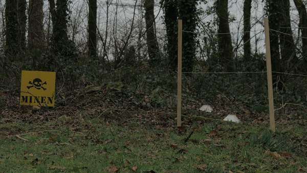 Reenactment of a WW2 German minefield with mine warning sign. - Stock ...