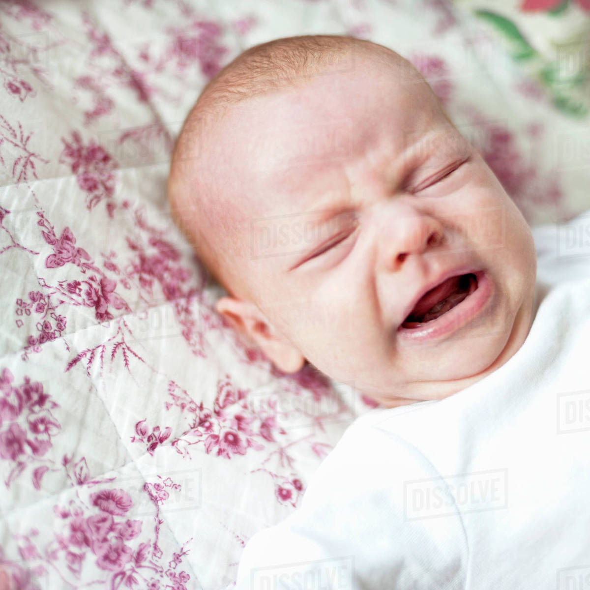 Close-up of crying baby - Royalty-free Stock Photo | Dissolve