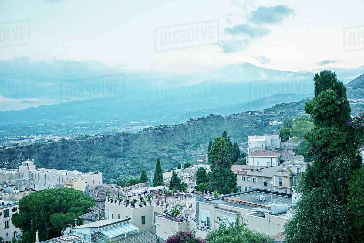 Buildings on hills - Stock Photo - Dissolve