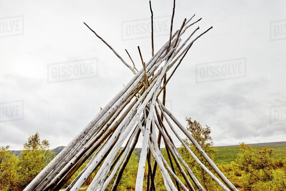 Teepee-shaped log structure - Royalty-free Stock Photo | Dissolve