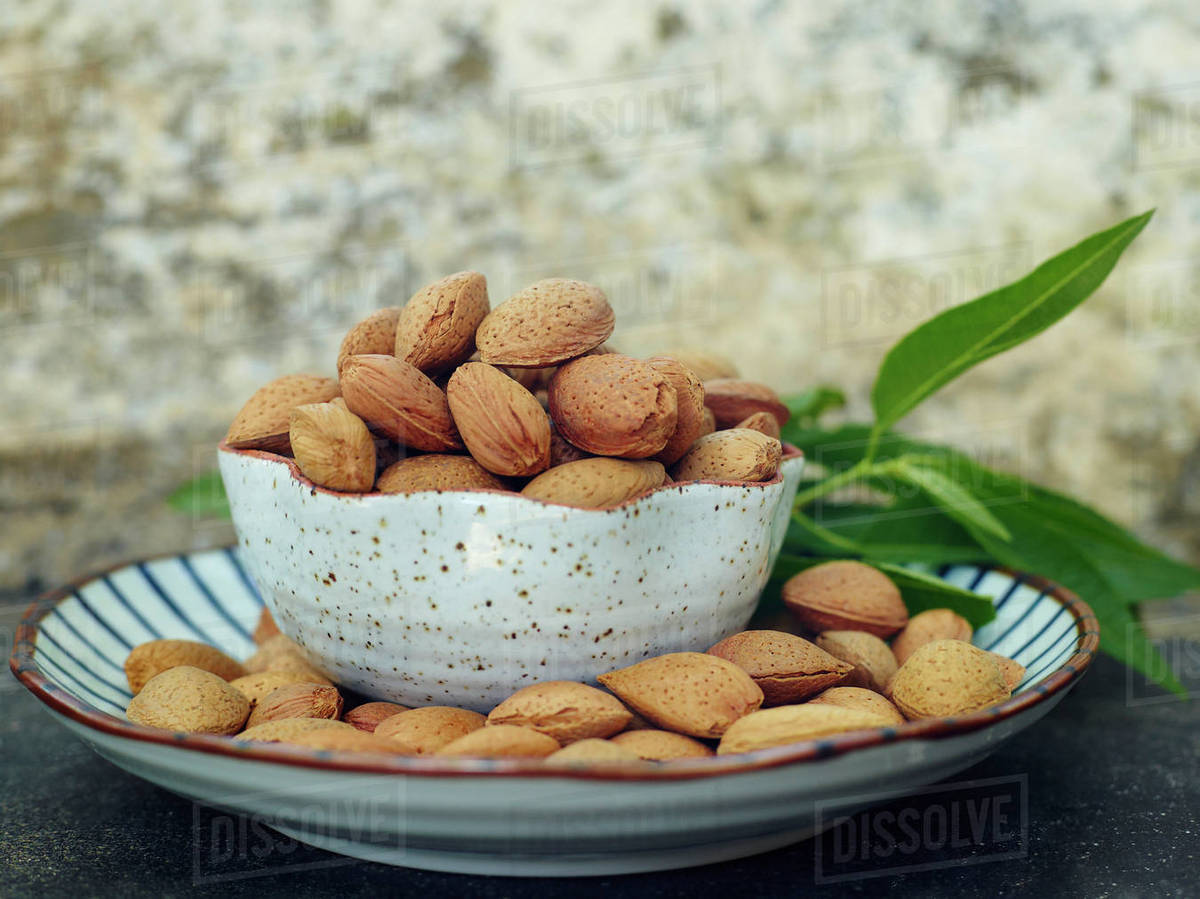 Almonds in bowl - Royalty-free Stock Photo | Dissolve