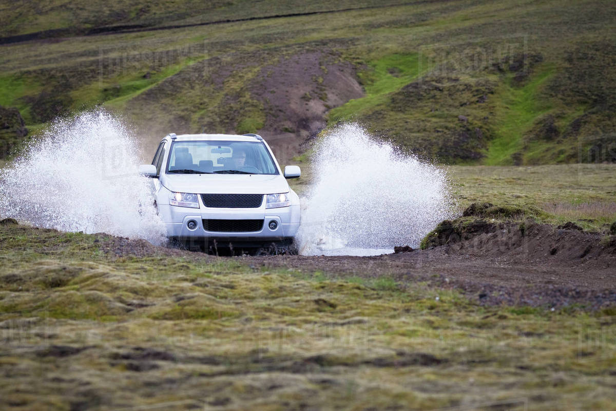 Car crossing water - Royalty-free Stock Photo | Dissolve
