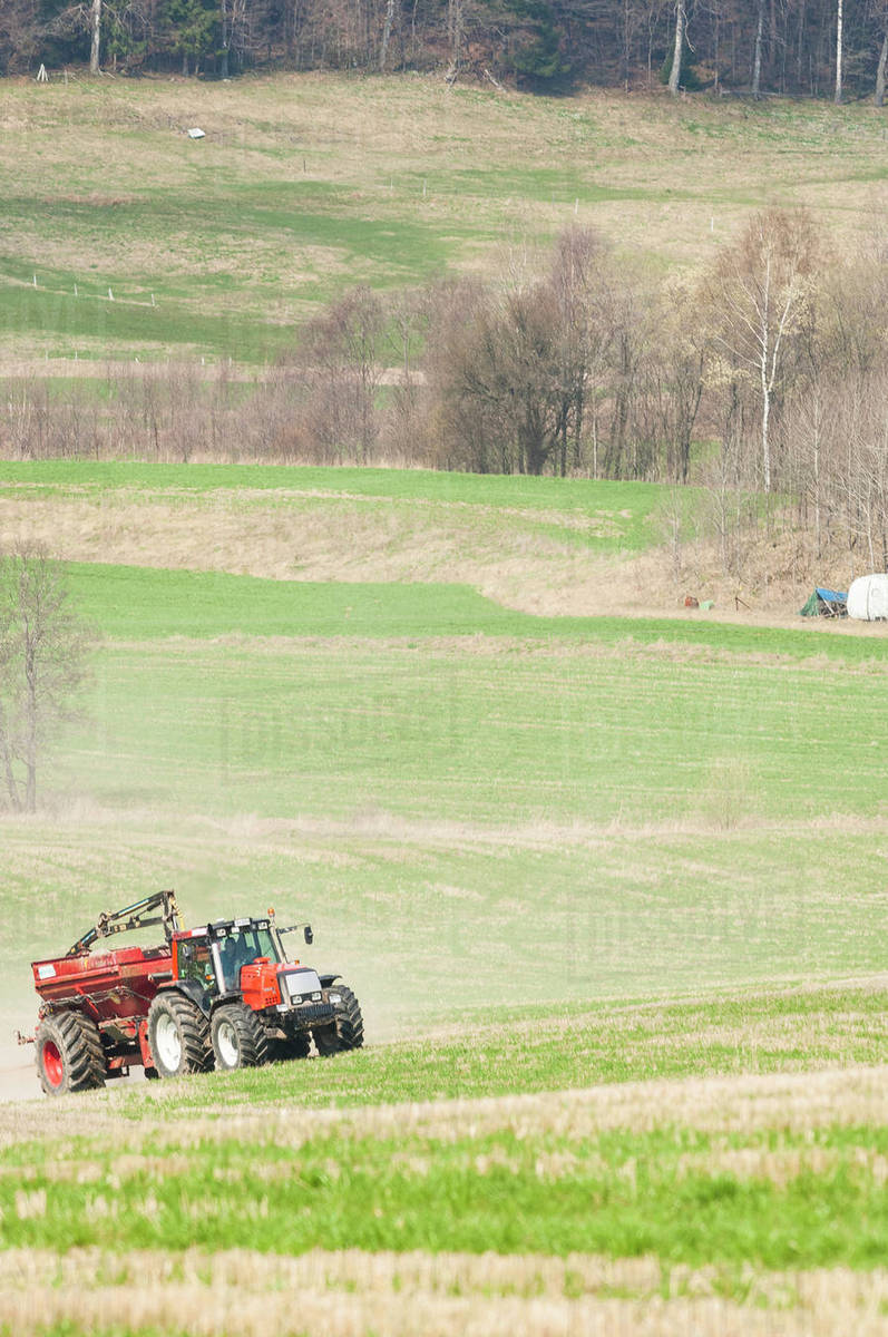 Tractor on field - Royalty-free Stock Photo | Dissolve