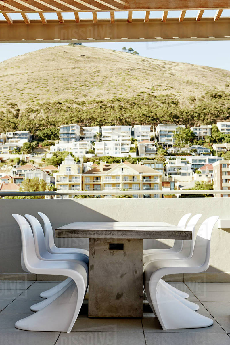 Dining table on terrace - Stock Photo - Dissolve