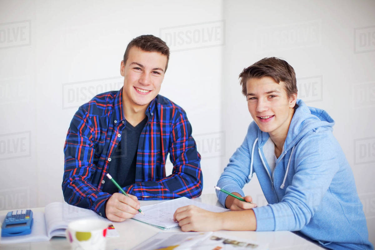 Teenage boys doing homework - Royalty-free Stock Photo | Dissolve
