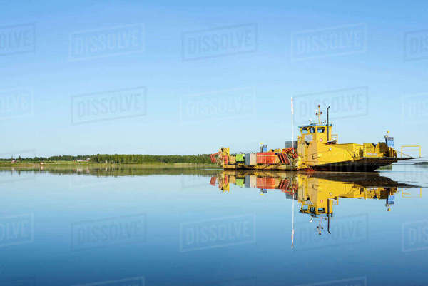Barge on water - Stock Photo - Dissolve