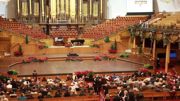 People look at the christus statue at salt lake city temple square ...