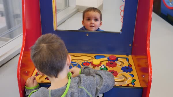 Little kids playing with fun colorful toys - Stock Video Footage - Dissolve