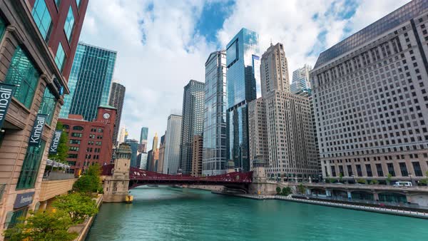Time-lapse of boats travling on the Chicago River in Downtown Chicago ...