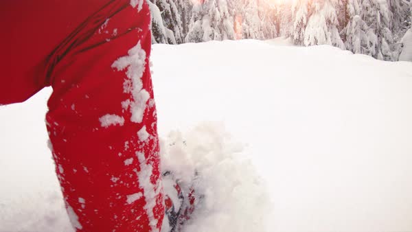 Snowshoeing Deep Untouched Powder Snow in Winter Snowfall - 4K Royalty ...