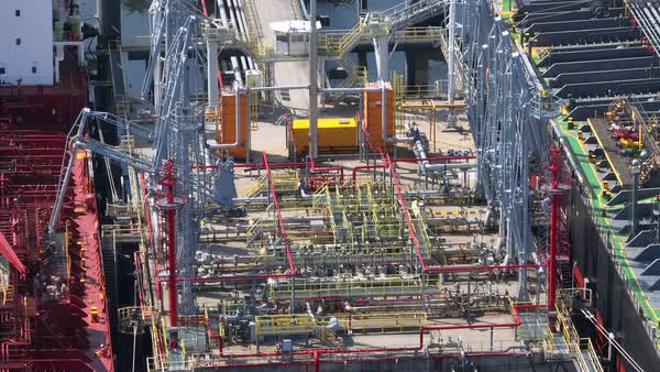 Liquid Cargo Transporter Ship Unloading Crude Oil to a Fuel Depot - 4K ...