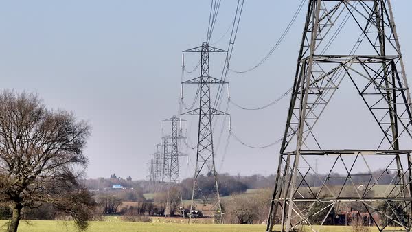 Rows of High Voltage Lattice Power Line Towers Aerial View - Stock ...