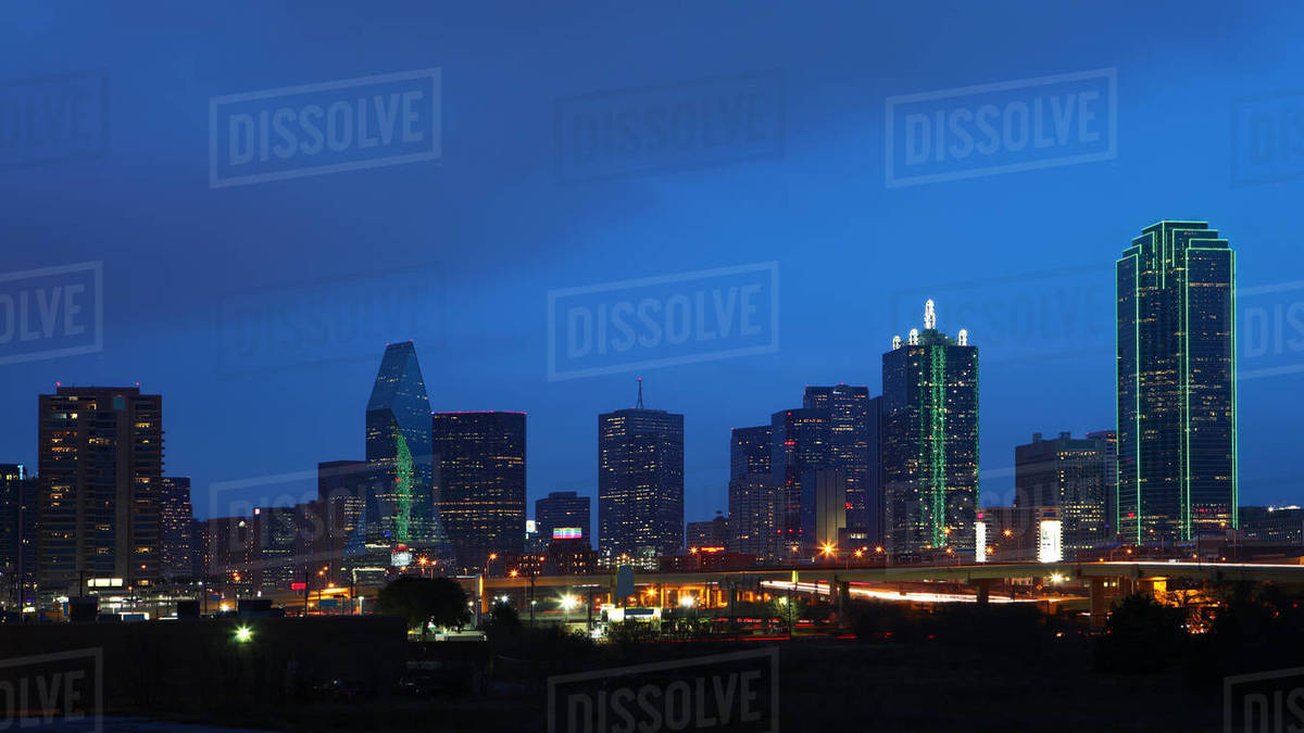 The skyline of Dallas at night - Stock Photo - Dissolve