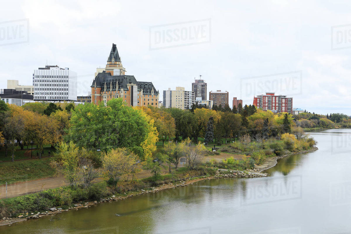 The Saskatoon, Canada skyline by river - Royalty-free Stock Photo ...