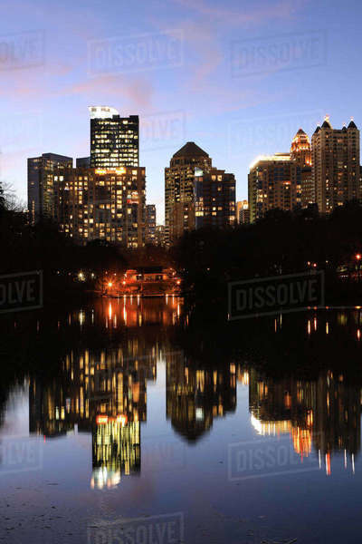 A Vertical of Atlanta, Georgia skyline at night with reflections ...