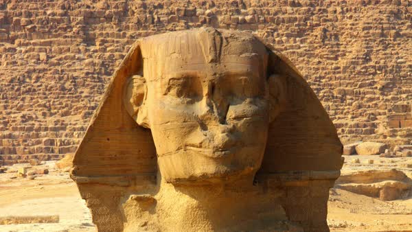Famous ancient egypt sphinx head smiles and winks, Giza Cairo, Egypt ...