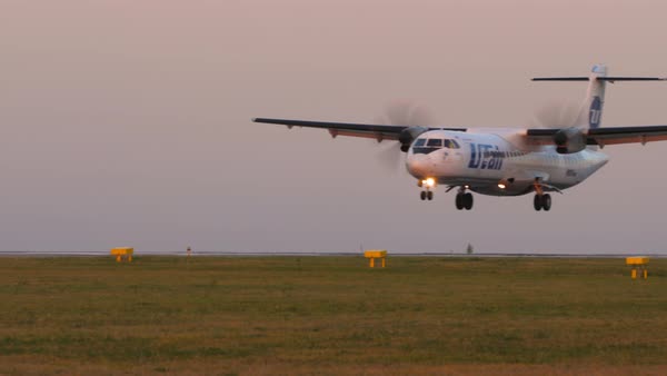 KAZAN, RUSSIA - Aircraft ATR-72 of UTair arriving. Turboprop plane ...