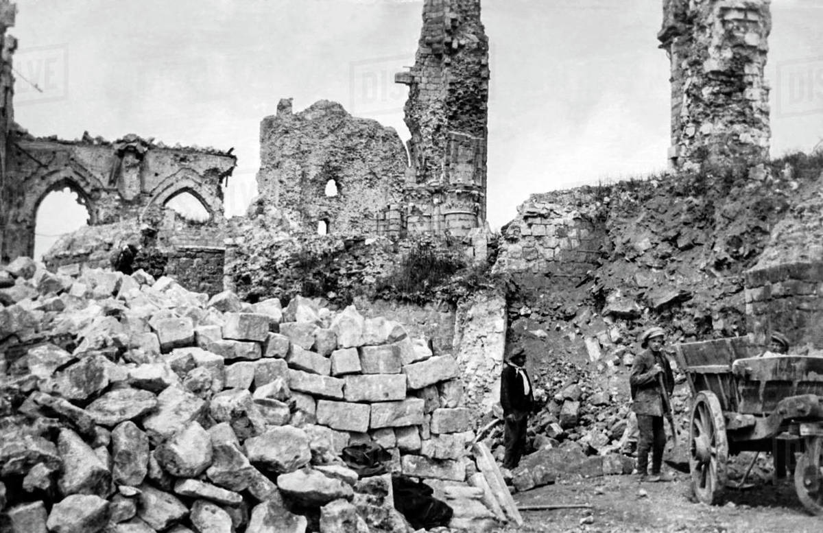 Historic image of ruins of buildings and a pile of rubble and stone ...