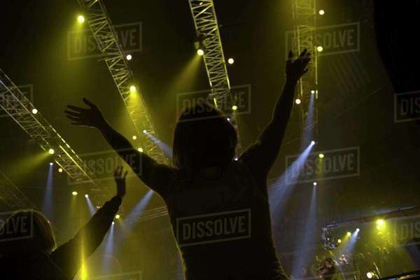 View Of Concert Stage From Audience At Night - Stock Photo - Dissolve