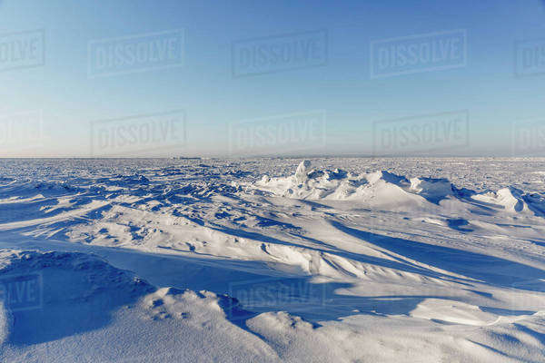 Snow drifts covering sea ice pressure ridges at Point Barrow, Arctic ...
