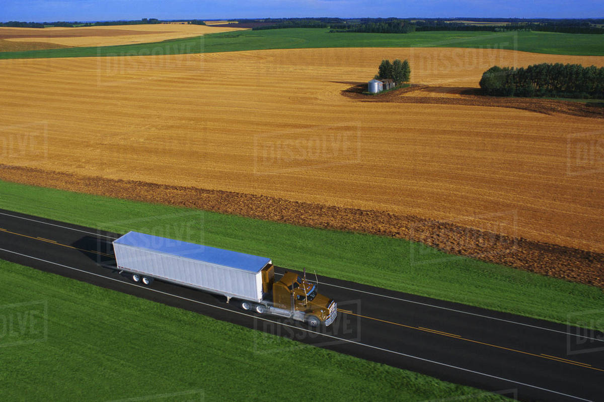 Semi Truck On Small Two Lane Highway - Royalty-free Stock Photo | Dissolve