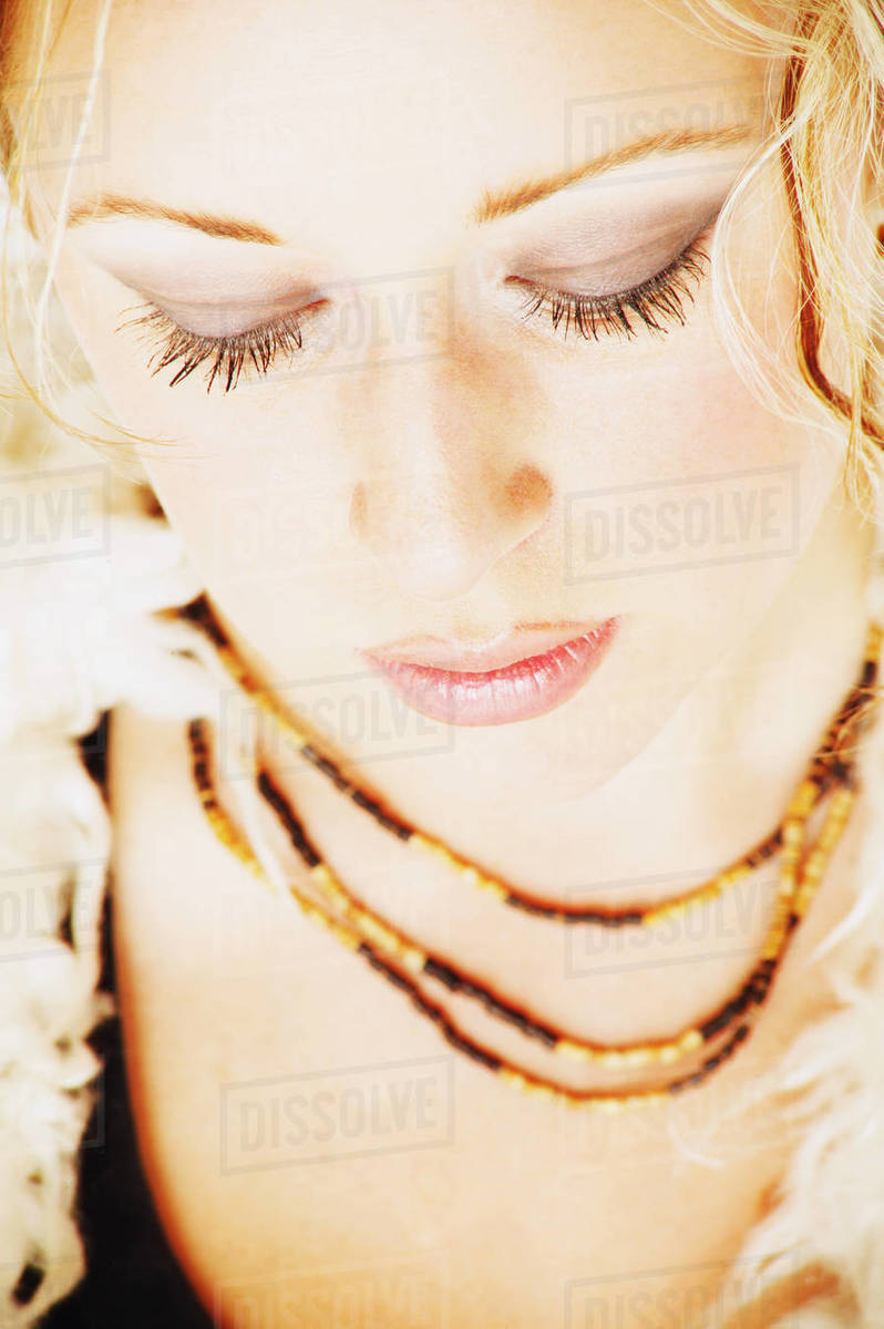 Attractive Woman Wearing Beads - Royalty-free Stock Photo | Dissolve