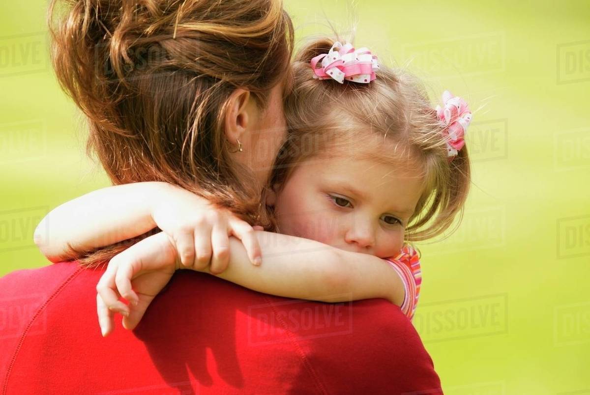 Mother And Child Embrace - Stock Photo - Dissolve