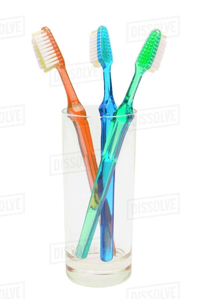 A Group Of Toothbrushes - Stock Photo - Dissolve
