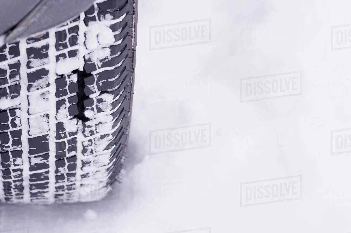 Snowy Tire - Stock Photo - Dissolve