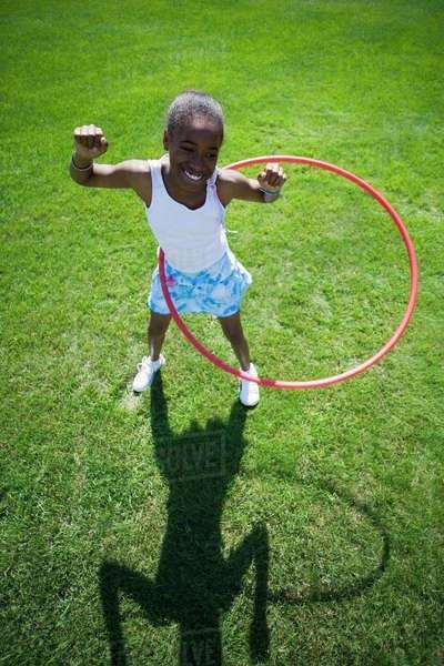 Child Playing With Hoop - Royalty-free Stock Photo | Dissolve