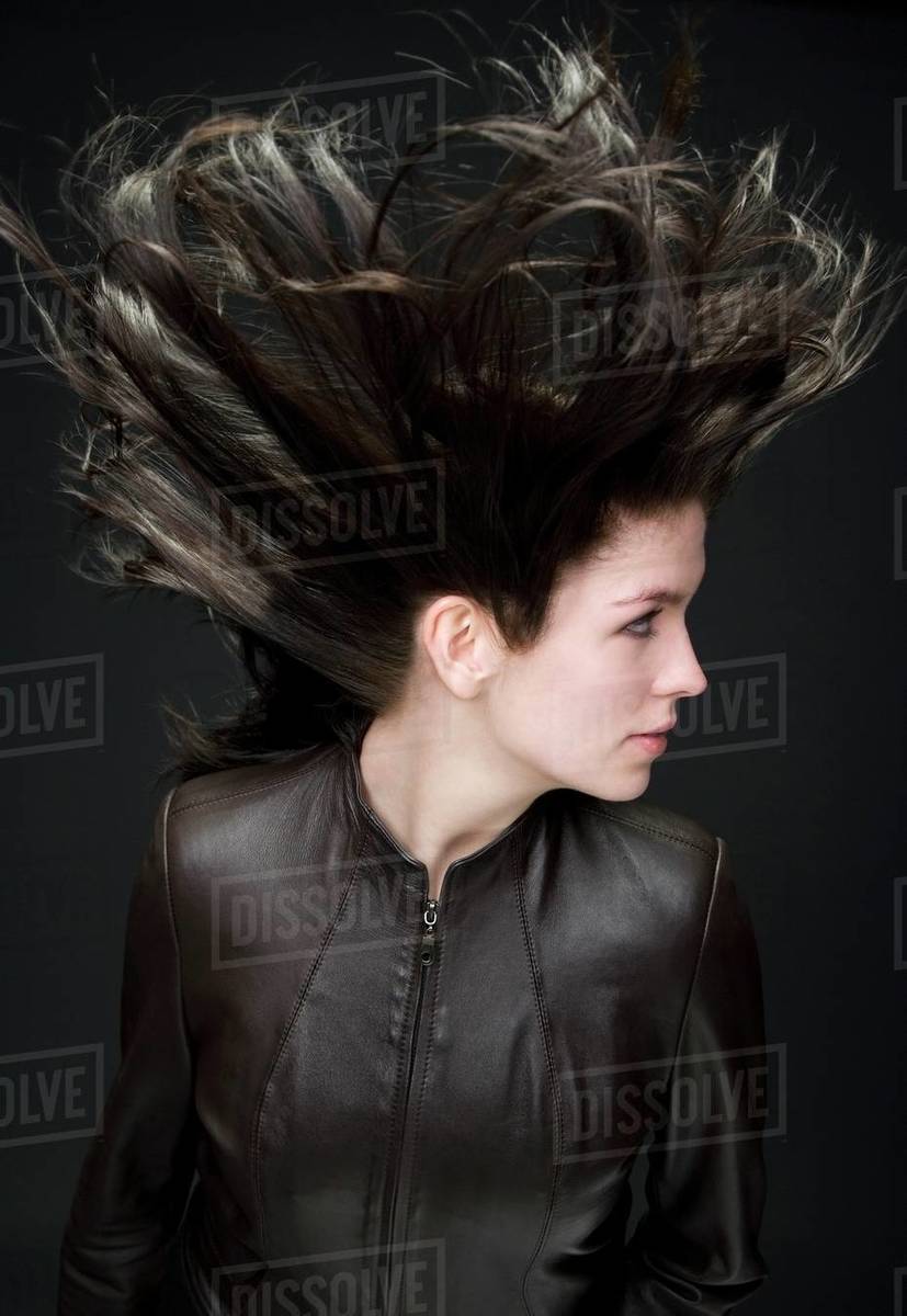 Woman With Wind Blown Hair - Royalty-free Stock Photo | Dissolve