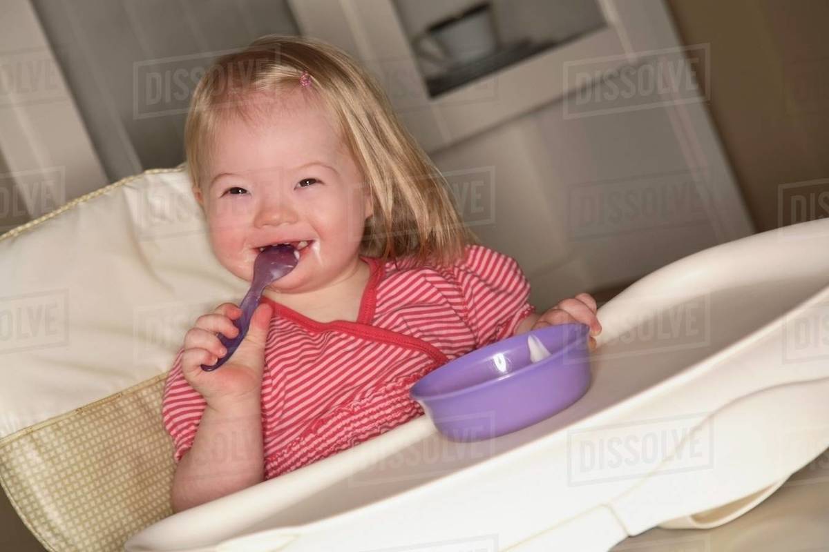 Young Girl In A High Chair - Royalty-free Stock Photo | Dissolve