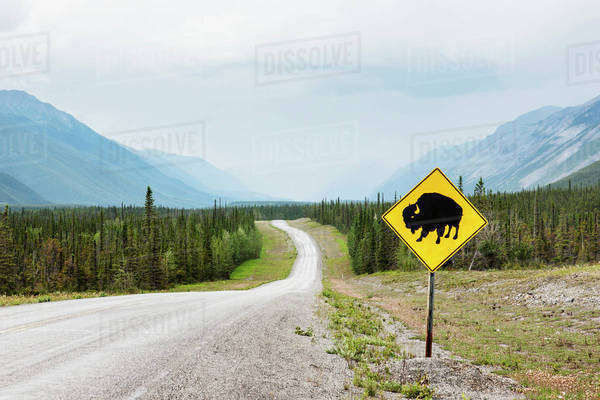 A Bison crossing sign along the Alaska Highway north of Muncho Lake ...