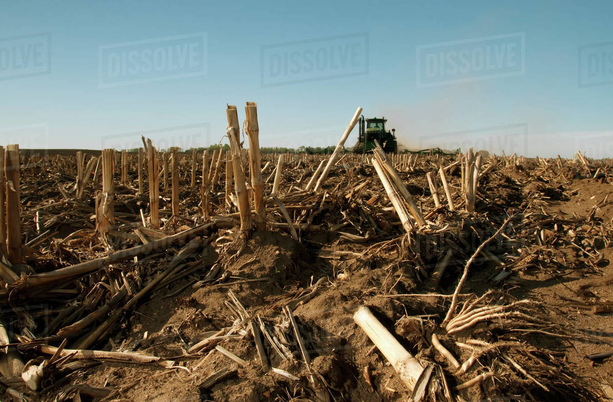 Agriculture - Low Angle View Of A Tractor Pulling A Tillage Implement ...