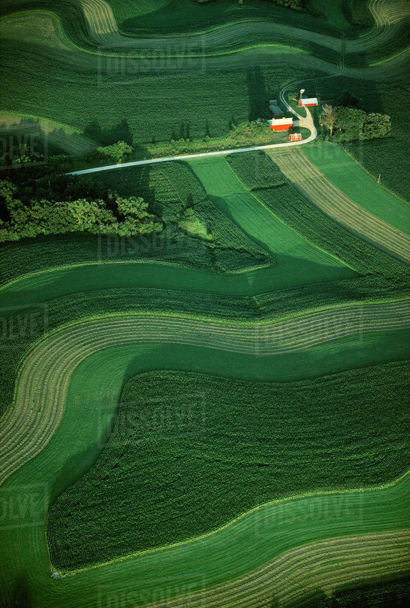 Agriculture - Aerial view of farmsteads and agricultural fields ...