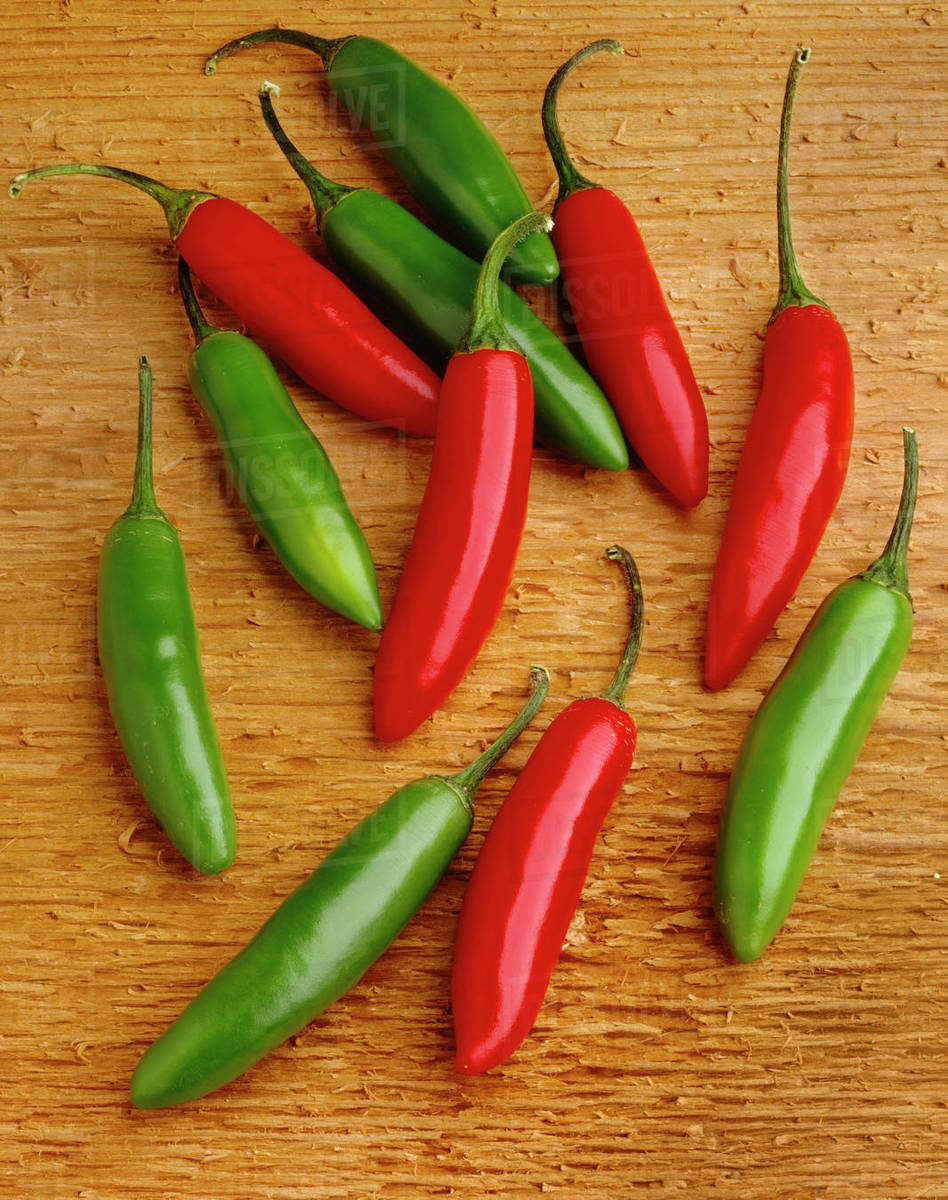 Agriculture - Red And Green Serrano Peppers. - Stock Photo - Dissolve
