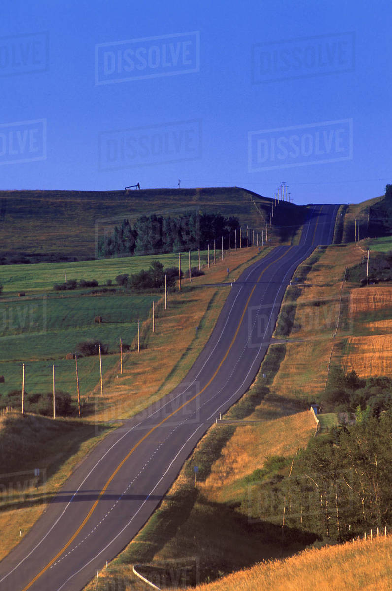 Highway On Hillside - Royalty-free Stock Photo | Dissolve
