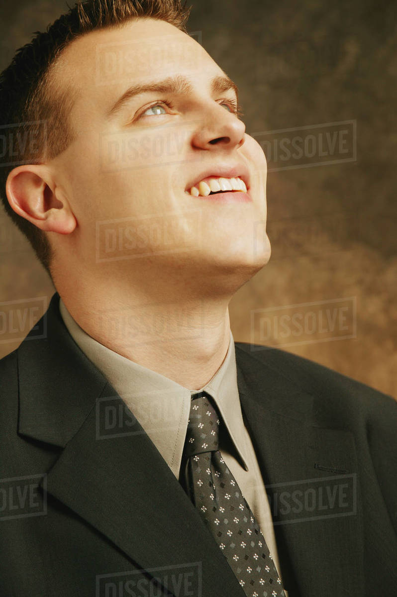 Professional Man Gazing Upward - Royalty-free Stock Photo | Dissolve