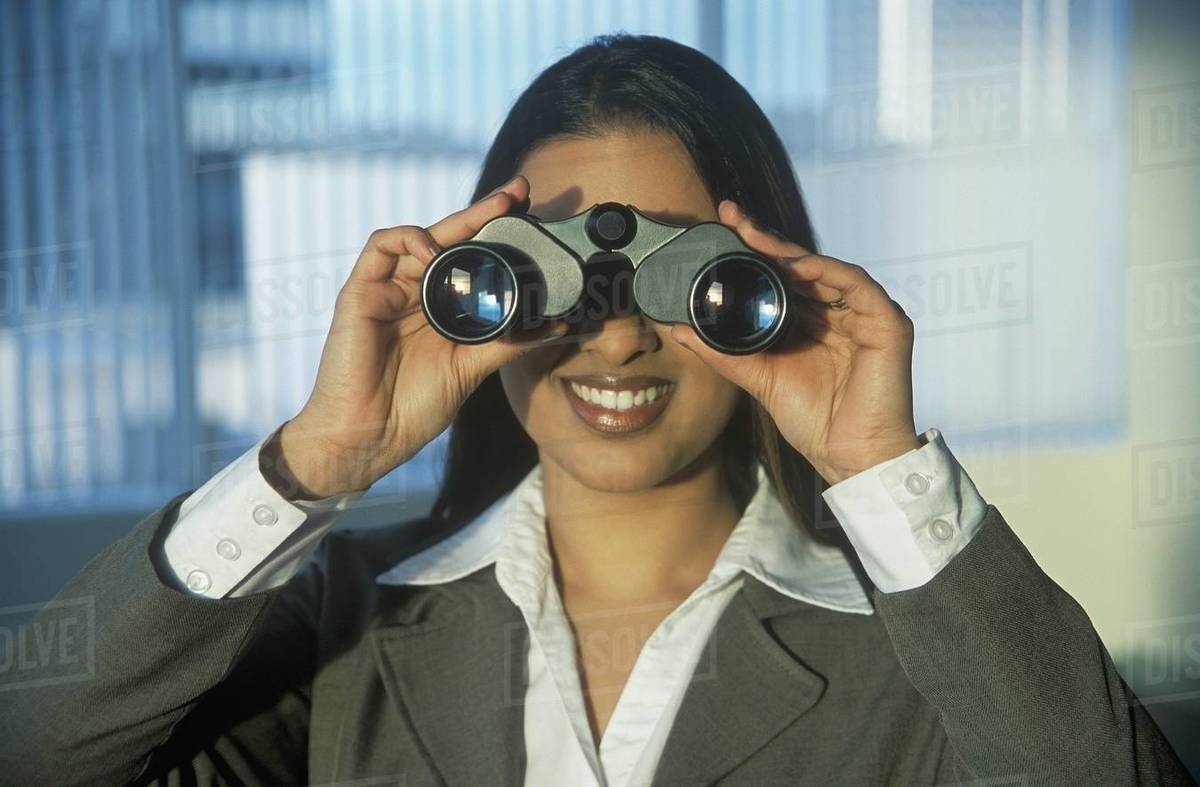 Woman With Binoculars - Stock Photo - Dissolve