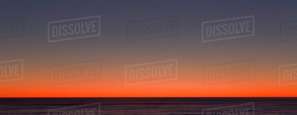 Beautiful burnt orange sunset, taken in the West Coast; South Island ...