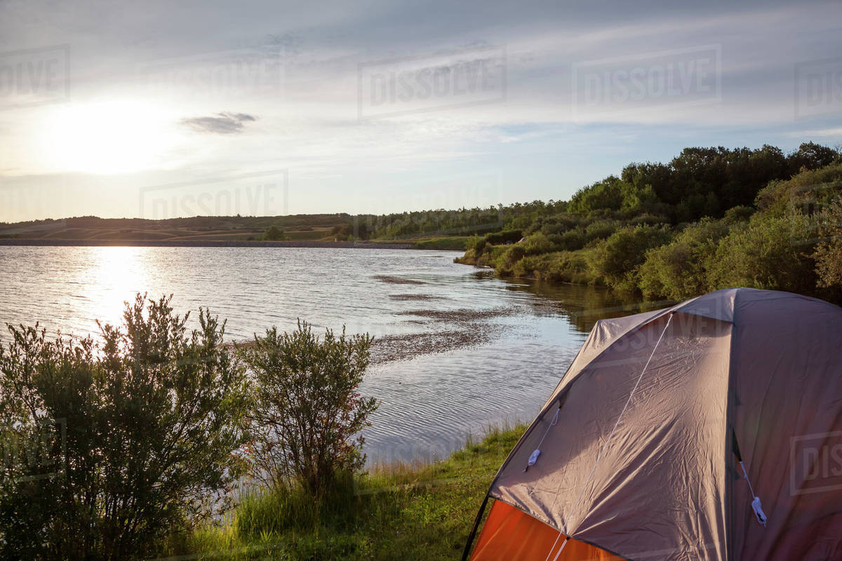 Watching the sunrise from a campsite on Payne Lake, Cardston County ...