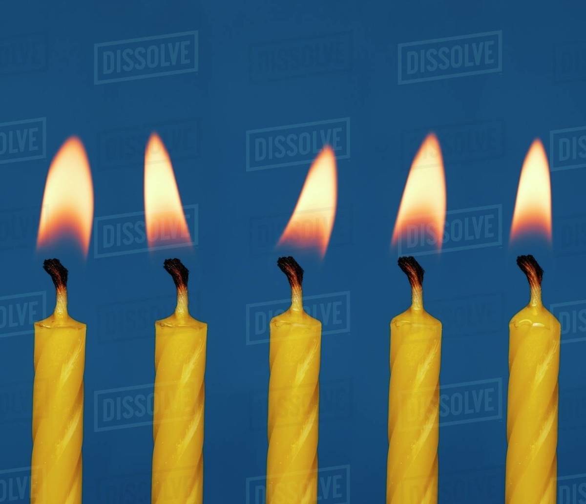 Five Candles Burning - Royalty-free Stock Photo | Dissolve