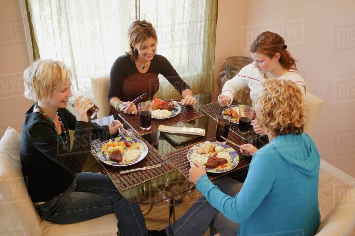 Eating A Meal Together - Royalty-free Stock Photo | Dissolve