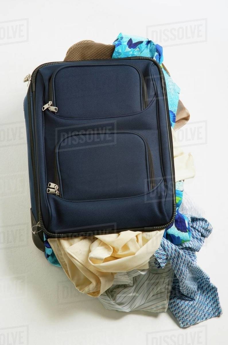 An Over-Stuffed Suitcase - Royalty-free Stock Photo | Dissolve