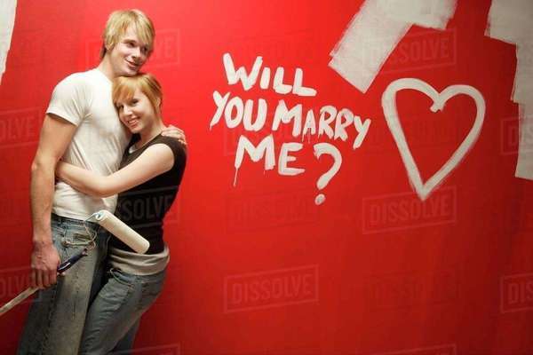 Man Proposes Creatively - Stock Photo - Dissolve