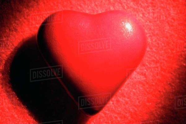 Single Red Heart - Stock Photo - Dissolve