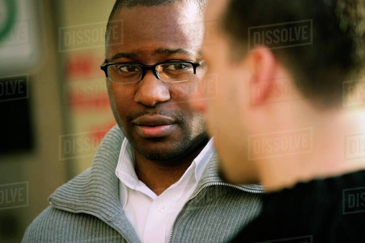 Two Men Conversing - Royalty-free Stock Photo | Dissolve