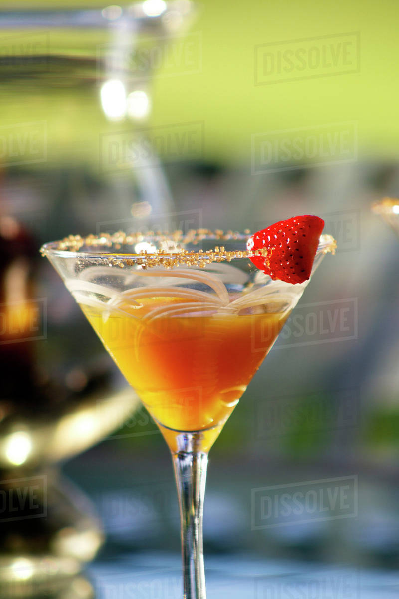 Hawaii, Maui, A tropical Mango Martini with strawberry garnish ...