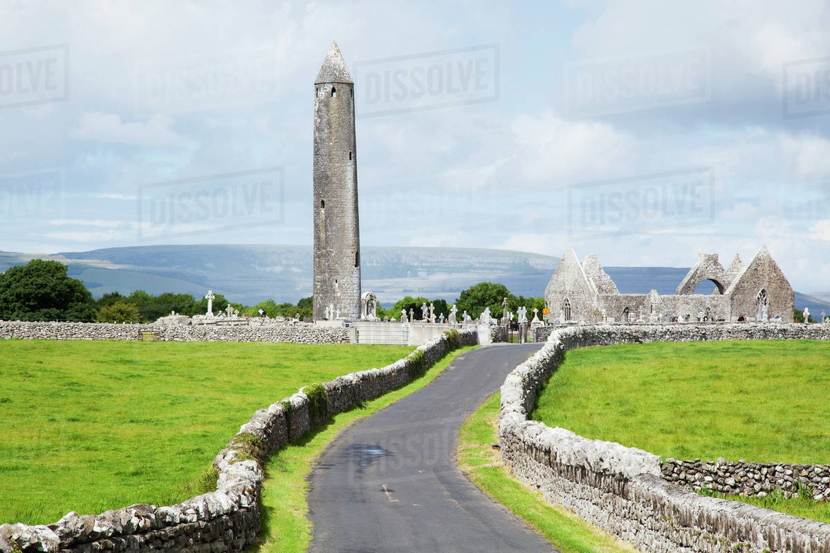 Round tower at Kilmacduagh Monastery; County Galway, Ireland - Royalty ...